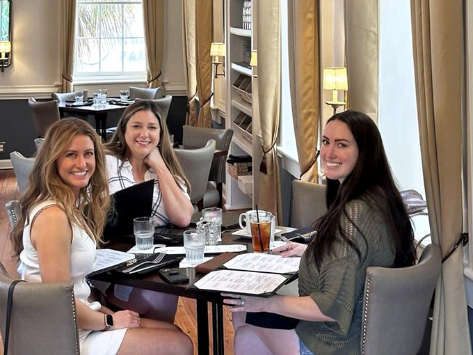 The dining room buzzes with the energy of friends sharing discoveries across the table—the universal language of good food bringing people together.