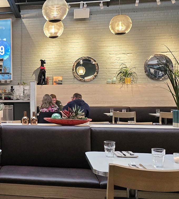 Every table tells a story at Poole's, where strangers become friends over shared bites of culinary brilliance.