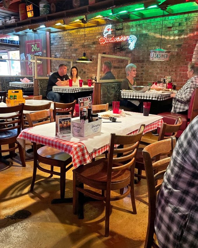 The dining area hums with conversation and clinking glasses—a symphony of satisfaction conducted under the glow of neon beer signs.