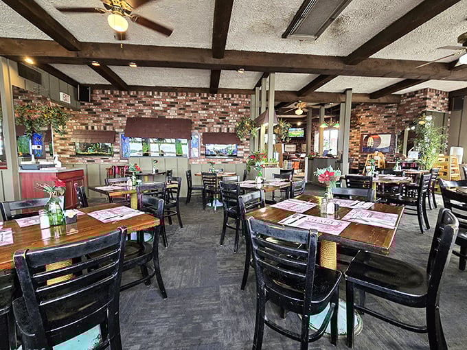 Brick walls, wooden tables, and the promise of seafood excellence—this dining room feels like the captain's quarters of a very successful pirate ship.