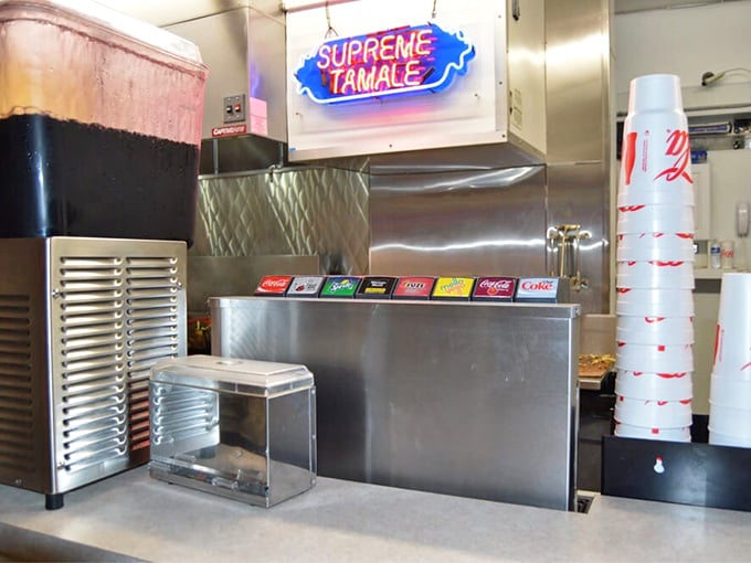 That neon "Supreme Tamales" sign isn't just illumination—it's a beacon of hope in a world of mediocre street food.
