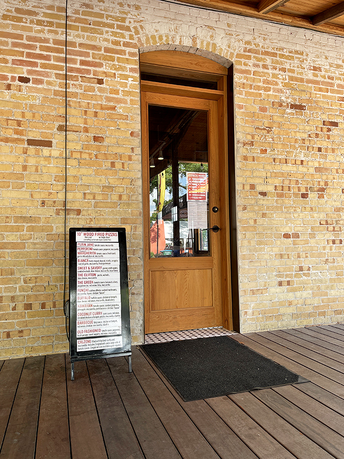 The entrance tells a story before you even step inside—a menu board of possibilities that makes decision-making deliciously difficult.