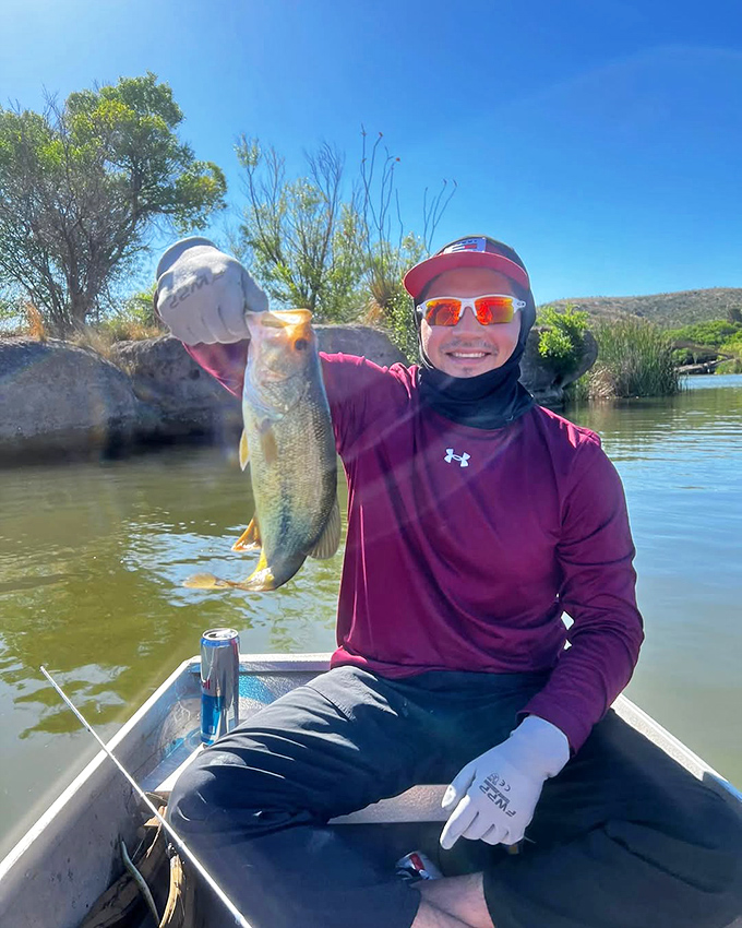 "I caught dinner AND bragging rights!" That smile says it all—largemouth bass: 0, Happy angler: 1.