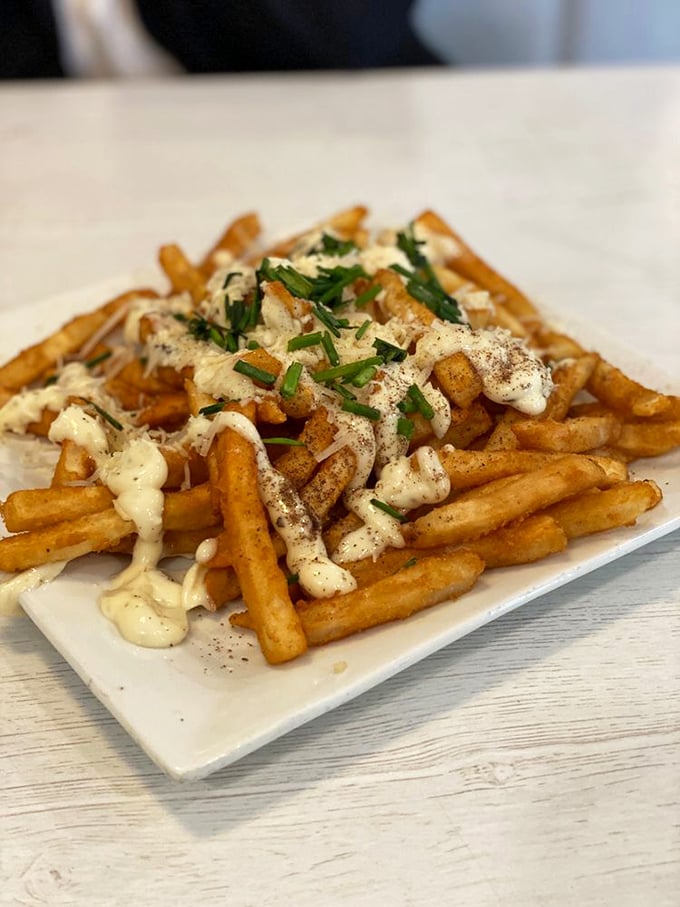 These aren't just fries – they're a canvas for culinary creativity. Drizzled with sauce, sprinkled with herbs, and destined to disappear faster than you'd expect.