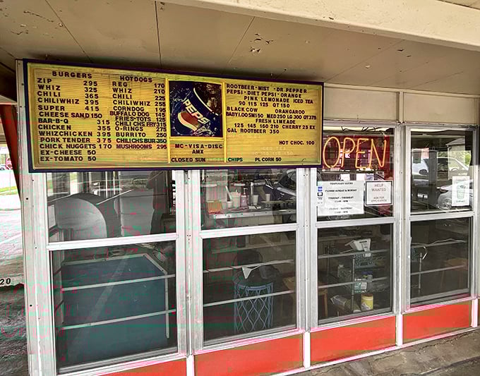 The ordering window—where dreams and hunger meet. Simple, straightforward, and ready to serve up happiness on a tray.