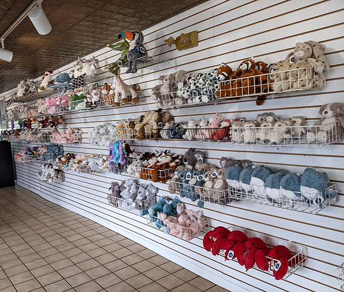 The gift shop wall isn't just selling stuffed animals—it's offering the chance to take home a cuddly souvenir of your pancake pilgrimage.