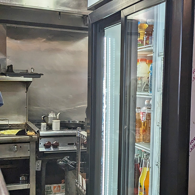 Where the magic happens! A glimpse into the compact kitchen that produces those legendary tenderloins—efficiency in stainless steel.