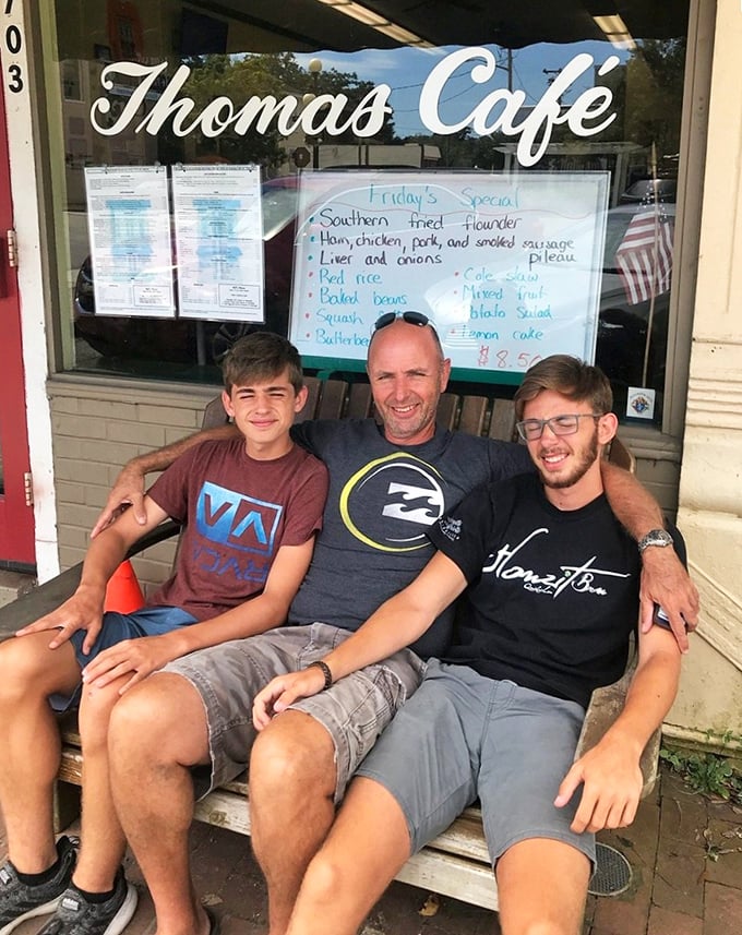 Happy patrons waiting for their Thomas Café fix. When the food is this good, even the bench outside becomes prime real estate.