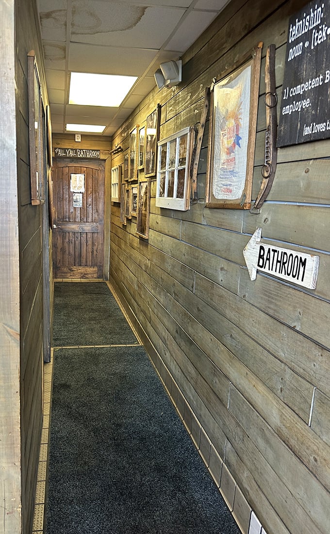Even the path to the restroom maintains the rustic charm. At a true BBQ joint, there are no design inconsistencies—just commitment to theme.