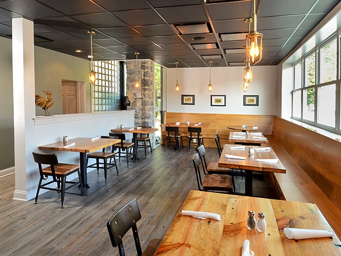 Simple tables bathed in natural light—because great BBQ doesn't need mood lighting to seduce you. It's confident in its smoky charms.