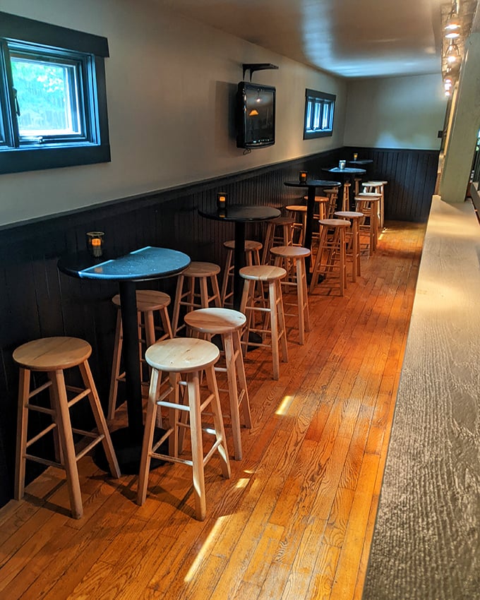 Wooden stools lined up like eager dinner guests, waiting for you to settle in and stay awhile. The perfect pre-dinner perch.