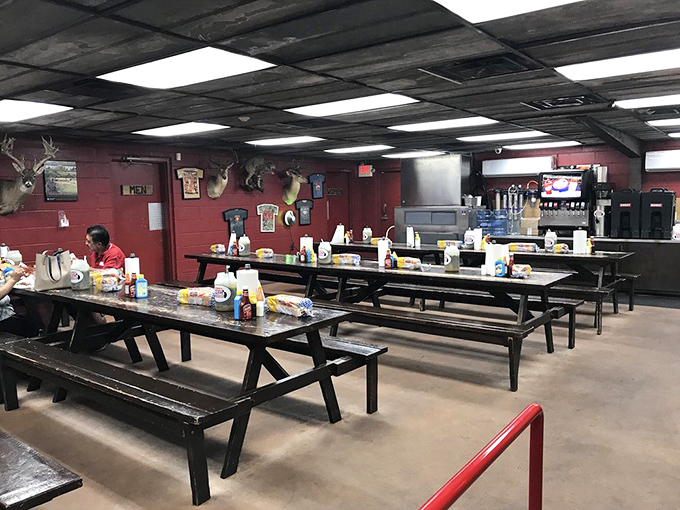 Red walls, mounted trophies, and picnic tables—Cooper's interior embraces the no-frills approach that lets the food do the talking.