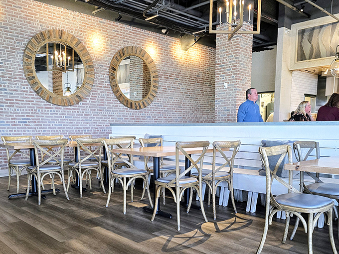Rustic meets refined with those circular mirrors reflecting all the good decisions you've made by coming here for dinner.