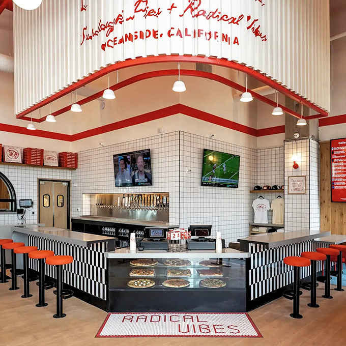 "Radical Vibes" indeed—the curved counter and retro-modern design make waiting for your order part of the experience rather than just purgatory.