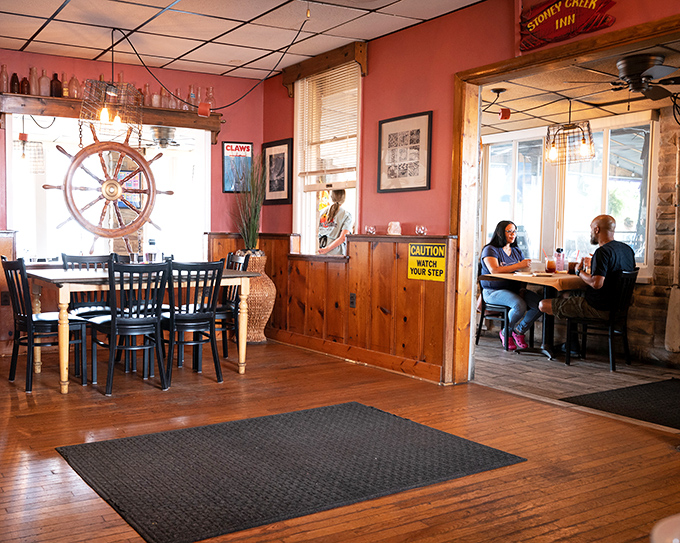 Wood paneling and warm lighting create the kind of atmosphere where strangers become friends.