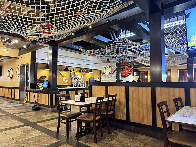 The dining room balances maritime charm with practical comfort. No pretentious ocean-to-table manifestos here—just an honest space for serious eating.