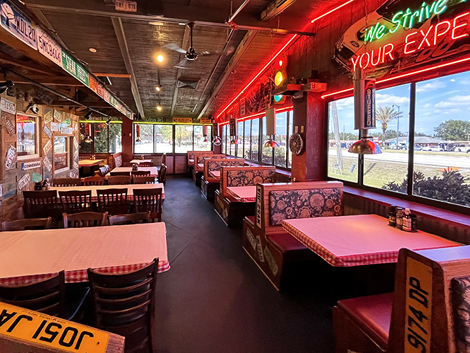 Where neon meets nostalgia and every booth tells a story. The red glow isn't lighting—it's the restaurant blushing from all the compliments.