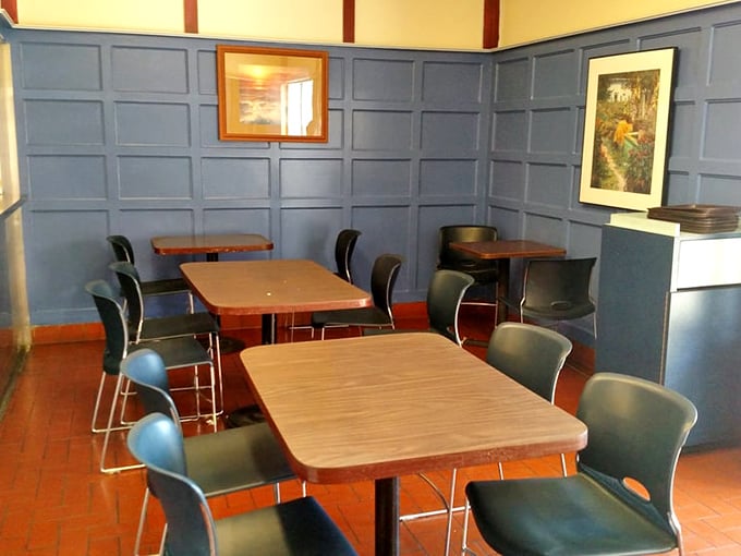 Blue paneling and simple tables create the perfect stage for the real star – food that doesn't need fancy surroundings to shine.
