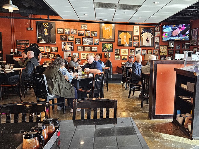 The dining room where strangers become friends over shared appreciation of smoke rings and sauce debates.
