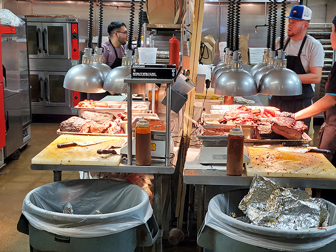 Behind the scenes, where BBQ magic happens. Those heat lamps aren't for warmth—they're spotlights for the stars of the show.
