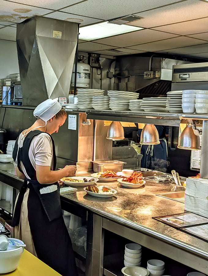 Behind the scenes, the kitchen hums with efficiency—where modern equipment meets time-honored cooking methods that can't be rushed or replicated.