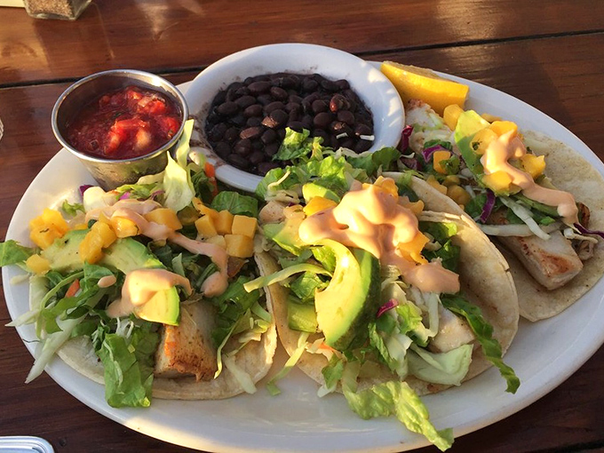 Fresh mahi mahi tacos served with black beans prove that coastal dining doesn't require pretentious attitude or prices.