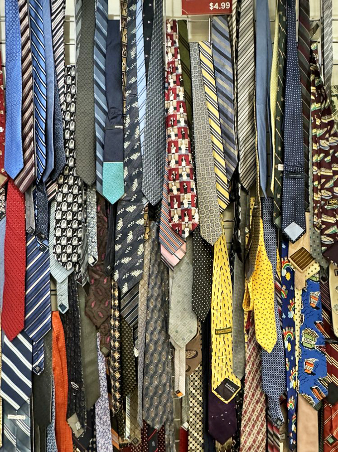 Neckties cascade in silky waterfalls of pattern and color. Each one once knotted at important meetings, weddings, or perhaps a prom night decades past.