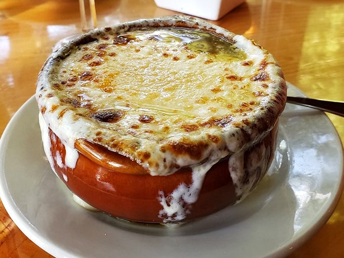 French onion soup that's worth the inevitable cheese-chin situation. That broiled crust is the edible equivalent of breaking through ice on a winter lake.