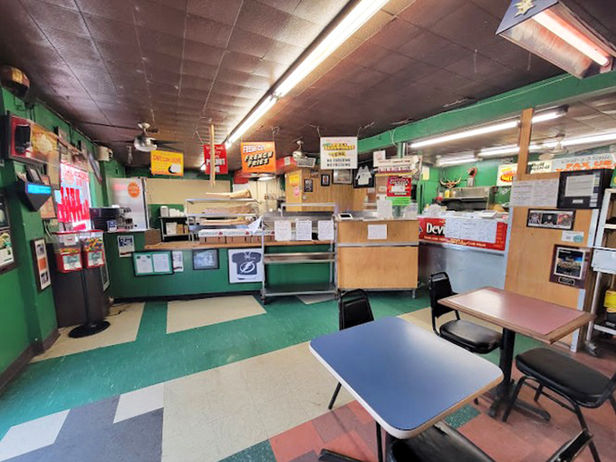 No-nonsense tables, well-worn floors, and walls that could tell stories. This isn't dining theater—it's the real-deal stage where authentic food takes the spotlight.