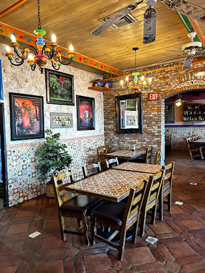The dining area balances rustic charm with authentic details—those colorful tiles and wooden ceiling create an atmosphere that enhances every bite.
