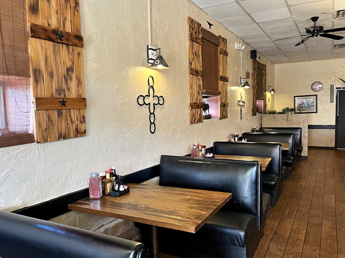 Black leather booths worn to perfect comfort, wooden accents, and Texas touches create that "I've finally found my place" feeling.