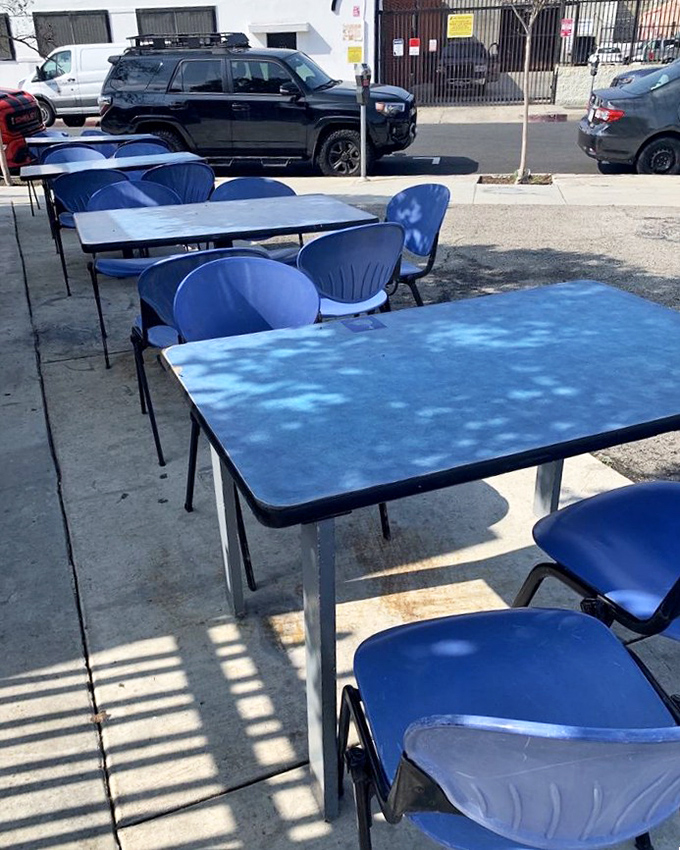These outdoor tables have witnessed more seafood euphoria than a maritime therapist. Simple blue tables where memories are made between bites of oceanic perfection.