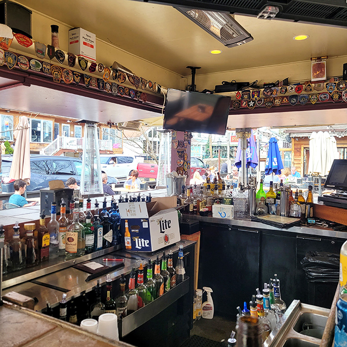 The bar – where strangers become friends and friends become family. That collection of patches tells tales of travelers past.