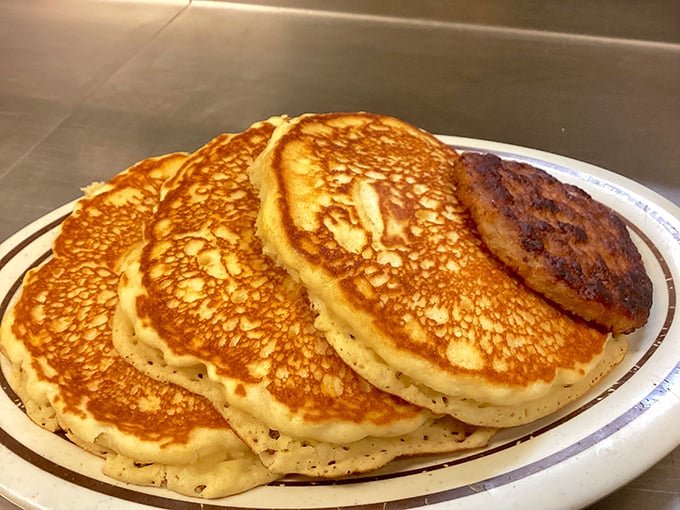 Pancakes stacked higher than your weekend expectations. These fluffy discs of joy are the breakfast equivalent of winning the lottery.