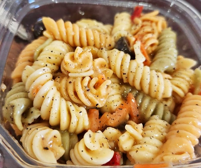 Fresh pasta salad that looks like it belongs at your favorite family reunion, not a roadside bakery.