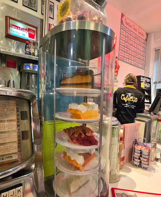 That pastry case is like a sweet treasure chest, tempting you with homemade delights behind glass.