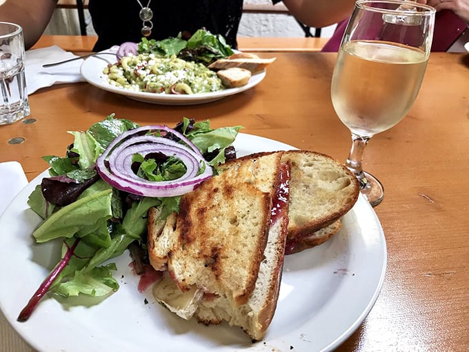 A sandwich that requires both hands and your full attention—mushrooms and melted cheese creating a vegetarian masterpiece worth writing home about.