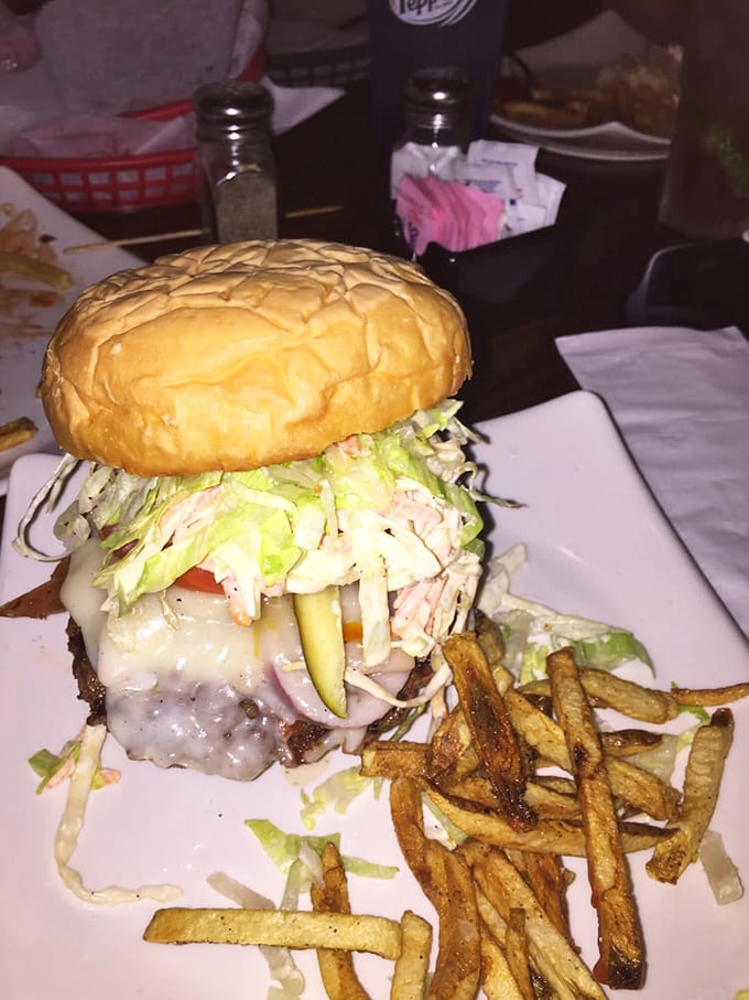 This isn't just a burger—it's architecture. The structural integrity alone deserves an engineering award, not to mention a place in your food dreams.