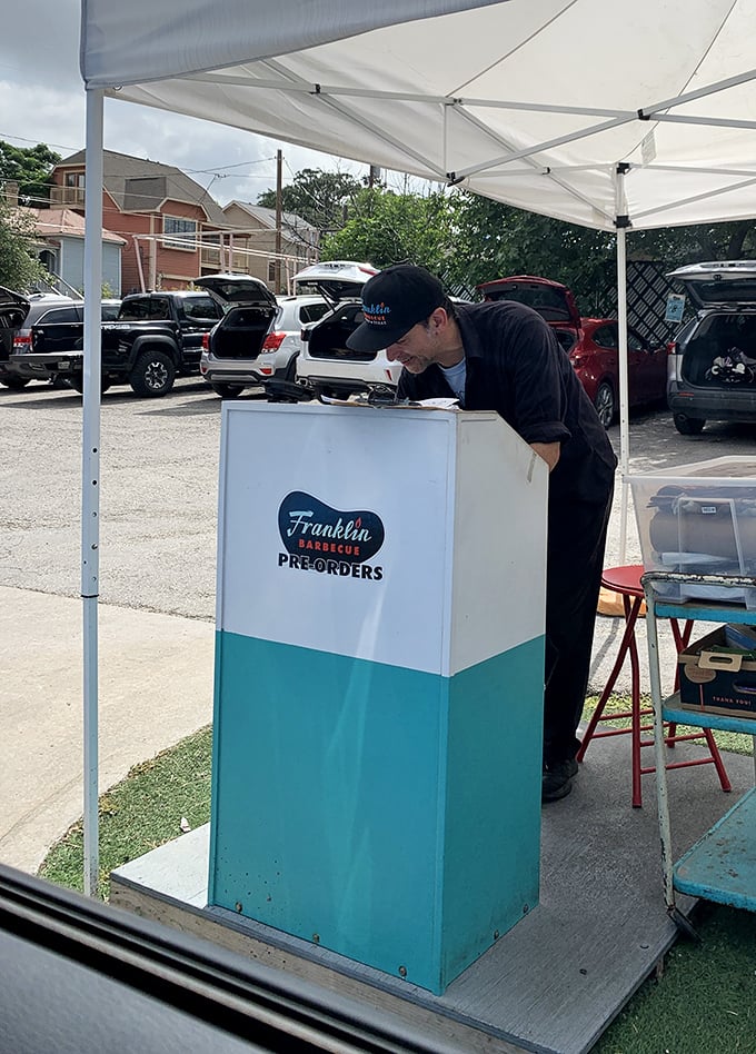 The pre-order pickup area – where the smart, the connected, or the extremely organized skip the legendary line. Planning has its privileges.