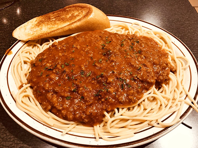 Spaghetti with meat sauce that doesn't pretend to be Italian grandmother authentic – just honest, hearty food that satisfies the soul.