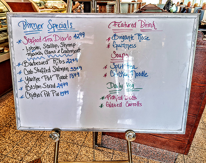 The specials board: where daily inspiration meets culinary tradition, and seafood fra diavolo competes with chicken pot pie for your affection.