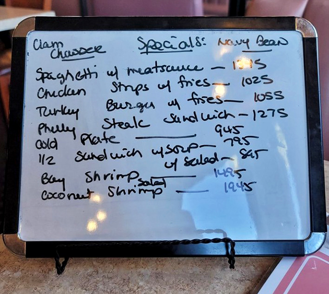 The specials board – where daily inspiration meets chalk artistry, and decisions become deliciously complicated.