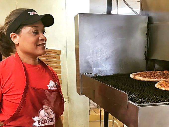 Behind every great pizza is someone who understands that cooking is part science, part art, and part magic—all three happening right before your eyes.