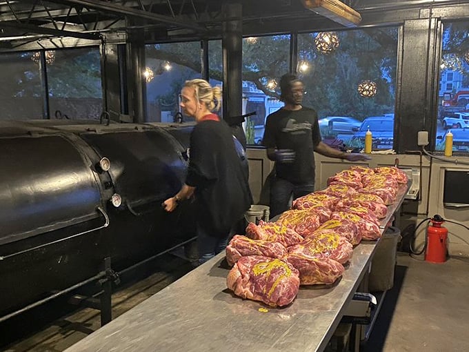 Behind the scenes where the magic happens—meat being prepped for its smoky transformation from ordinary to extraordinary.
