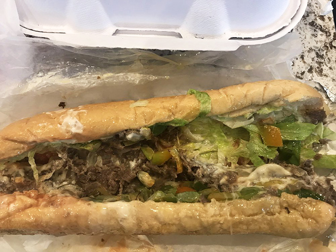 A sub that requires both hands and possibly a nap afterward. The kind of sandwich that makes you grateful for whoever invented bread.