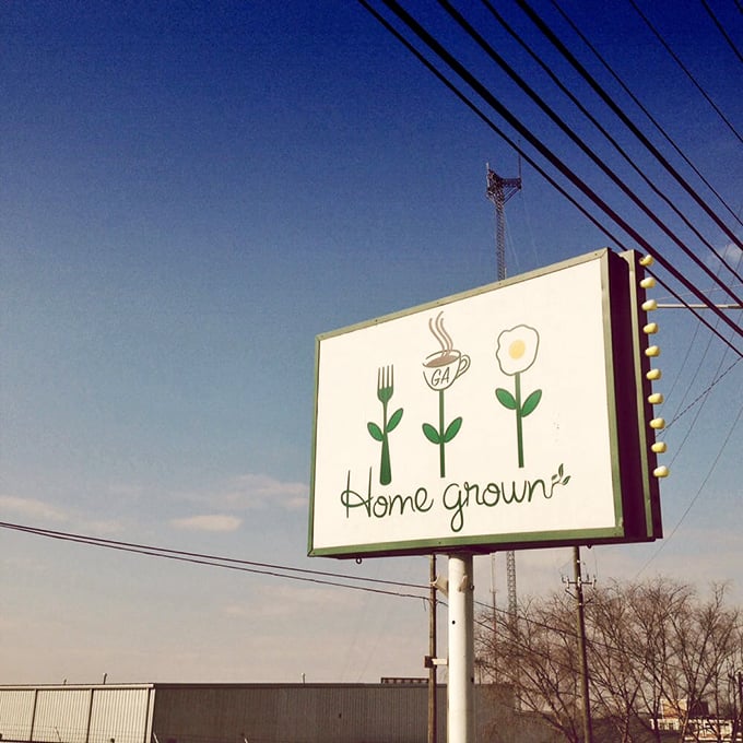 The Home Grown sign says it all—fork, coffee, egg. The holy trinity of breakfast, simplified into an elegant roadside beacon.