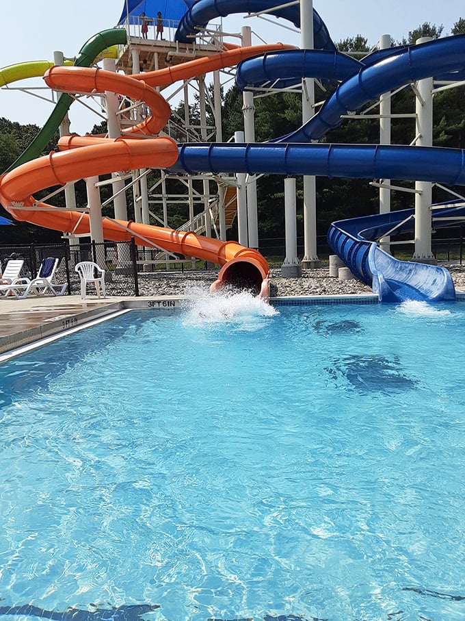 Water slide heaven where adults pretend they're just accompanying the kids, but that look of pure joy as they splash down doesn't lie.