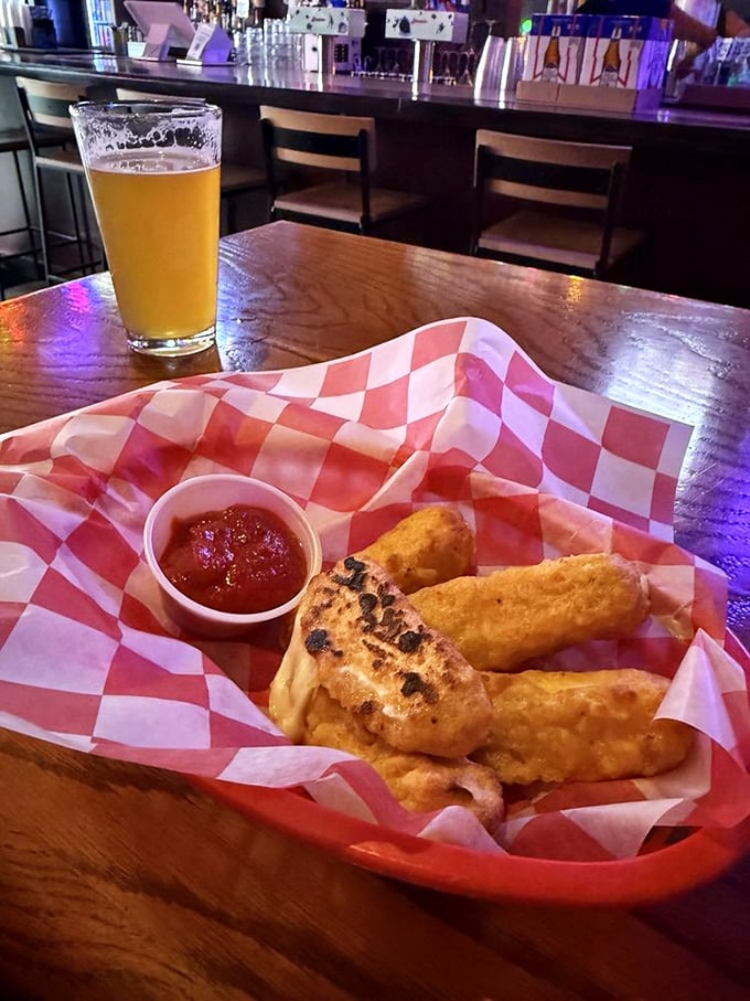 Crispy on the outside, tender on the inside—these aren't just chicken tenders, they're a masterclass in texture. Beer's perfect companion.