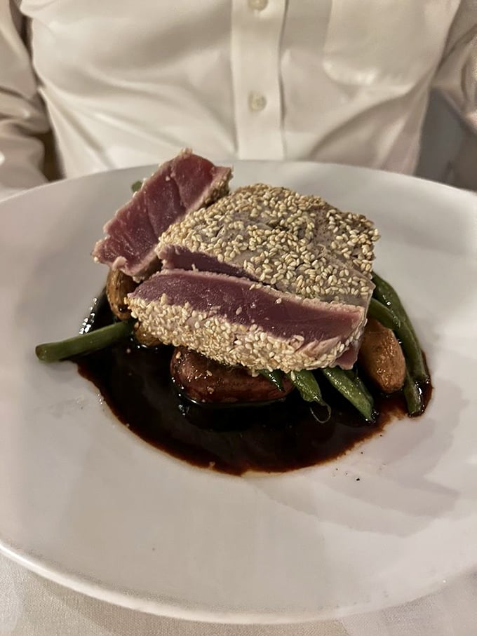 Sesame-crusted tuna that's blushing perfectly pink inside, proving that sometimes the best things in life are indeed rare.