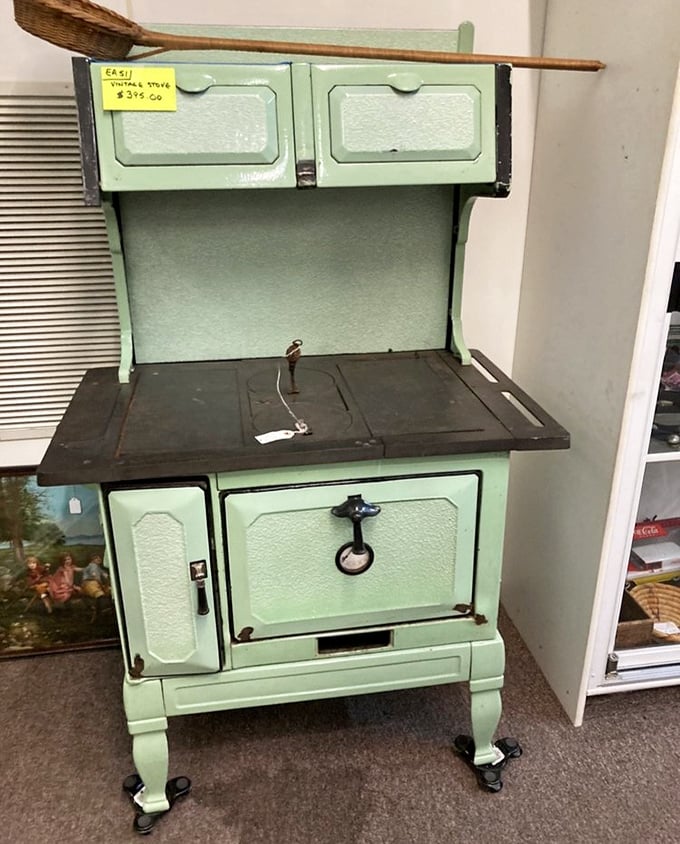 This mint-green vintage stove isn't just appliance—it's kitchen theater. Meals made here came with a side of performance art.